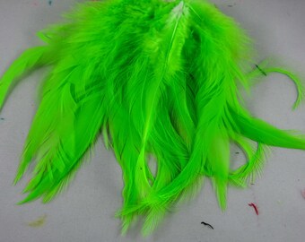 Lime green feathers | Etsy