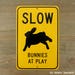 Slow Bunnies at Play pet rabbit novelty sign aluminum