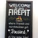 Fire Pit Sign Where Friends and Marshmallows Get Toasted At