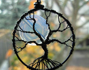 Solar Eclipse Sun and Moon Tree of Life Pendant Black Wire
