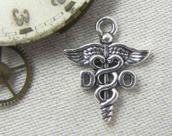 Caduceus symbol | Etsy