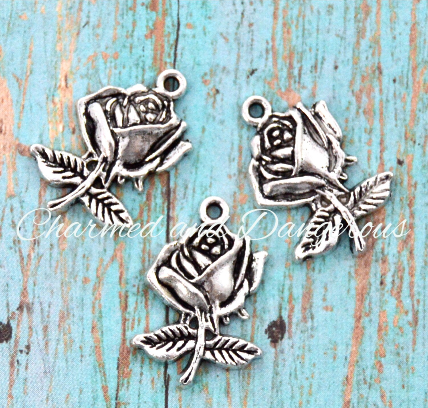 10 pewter Rose charms (CM245) from CharmedDangerousShop on Etsy Studio