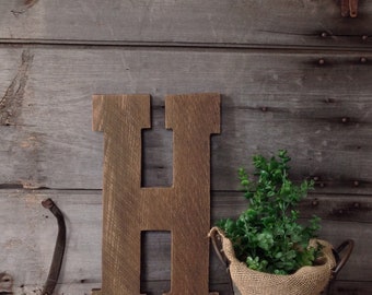 Barn Wood Letters measuring 24 inches tall with burlap bow