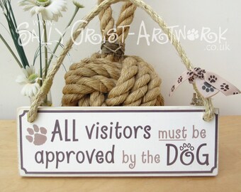 Handmade wooden door sign for dog and human in training.