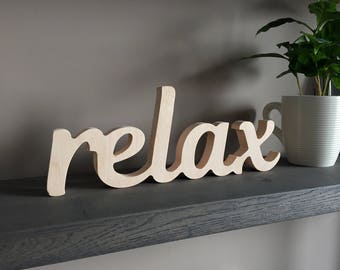 Wooden rustic 'smile' sign positive wood word smile