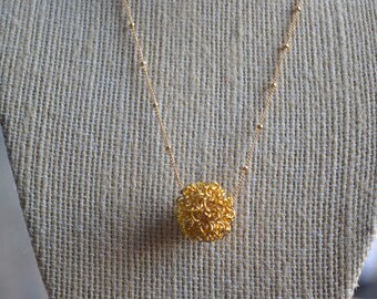 Gold ball necklace | Etsy