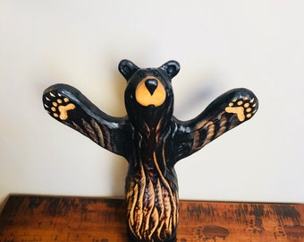 Chainsaw carved rail bear