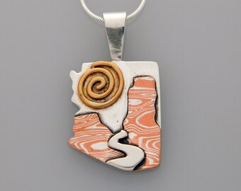 Mixed metal jewelry handcrafted with care by EvolveJewelryStudio