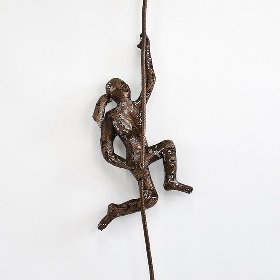 Climbing woman with rope wire mesh sculpture wall hanging
