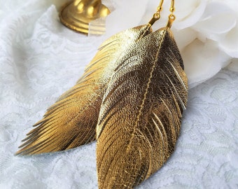 Feather earrings | Etsy