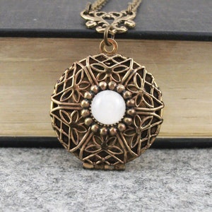 Filigree locket | Etsy