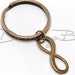 One Silver or Bronze Infinity Sign Keychain on Key Ring