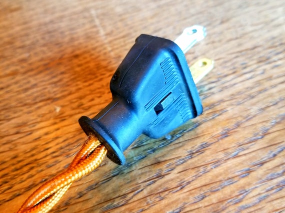 2 Prong Electrical Plug Black polarized male plug connector 2 Prong Electrical Plug Black polarized male plug connector