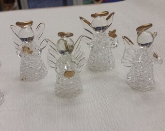 Handmade fused glass angel ornaments.