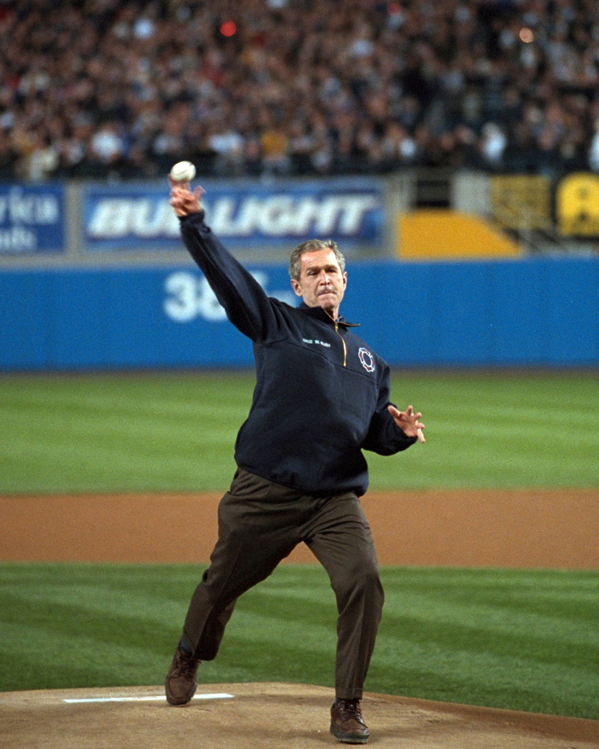 President George W. Bush Throws Out the First Pitch During the