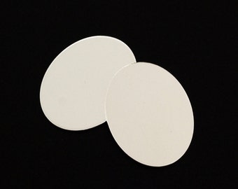 Sterling Silver Oval Disc with Heart cut outone pairor long