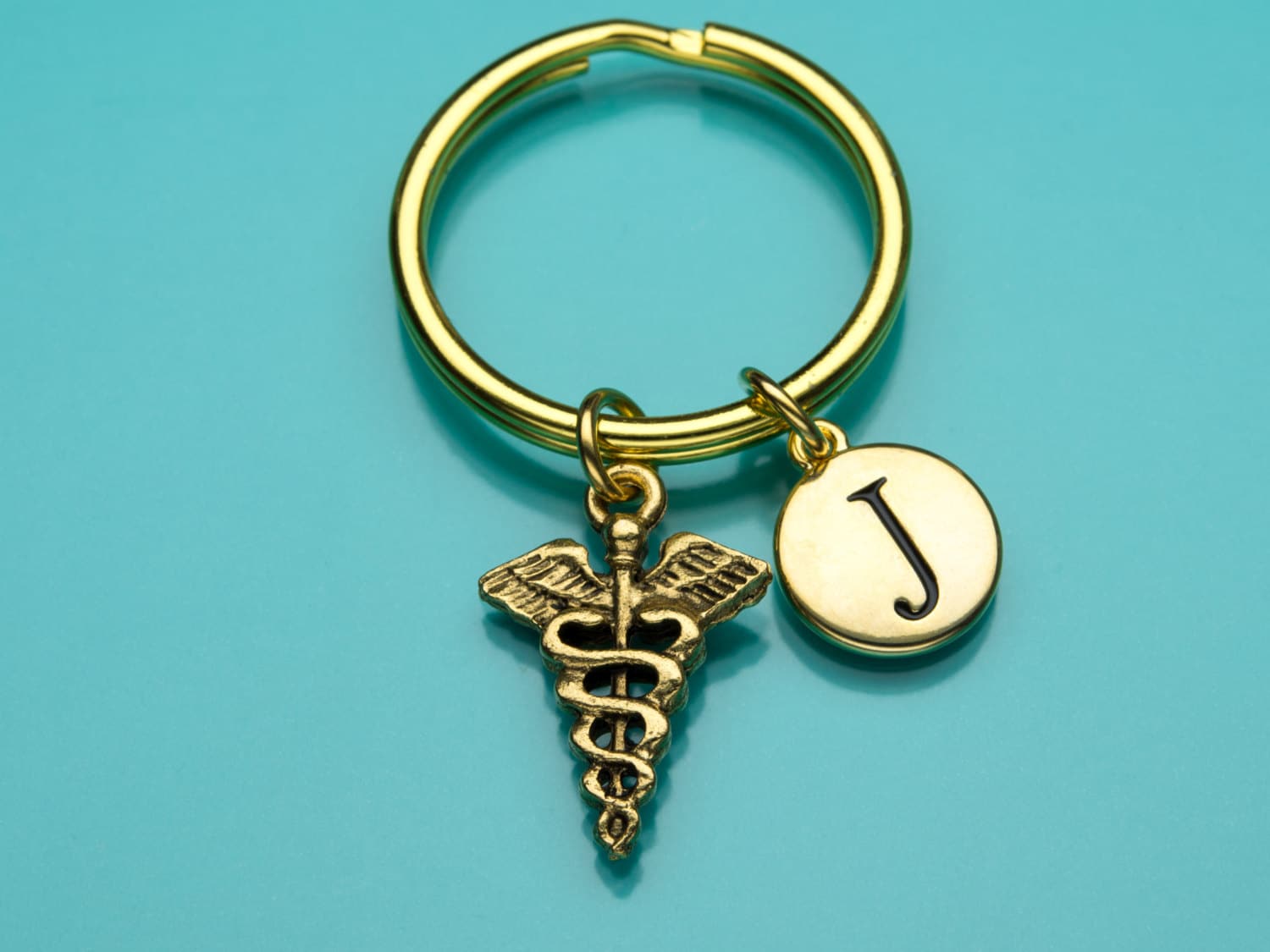 Caducée trousseau anneau or caducée symbole médical du