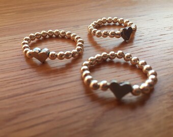 Subtle Wavy Rings in Twisted and Plain. Available in Copper