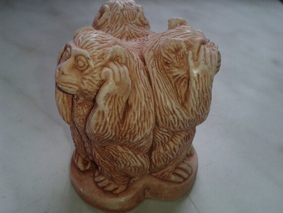 Three monkeys in a single statuette. Year of the monkey Table