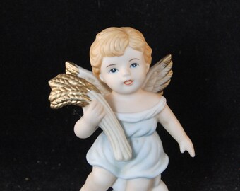 Cherub with flowers | Etsy