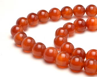 Red orange stone | Etsy