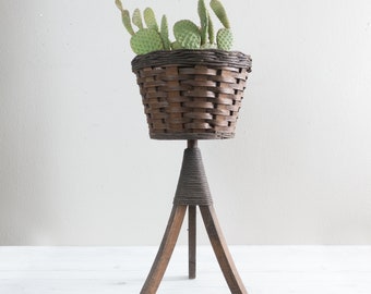 Wicker plant stand | Etsy